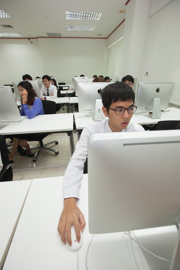 A Class of Students in Front of Their Screens Study Computer Science ...