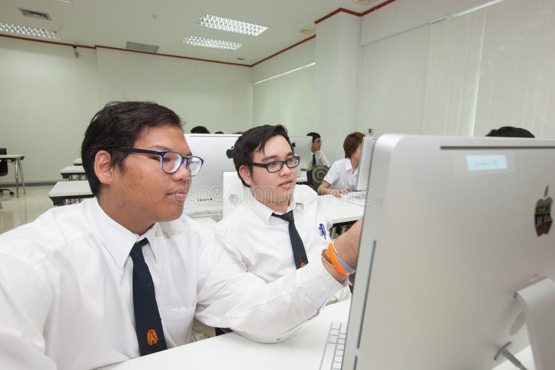 A Class of Students in Front of Their Screens Study Computer Science ...