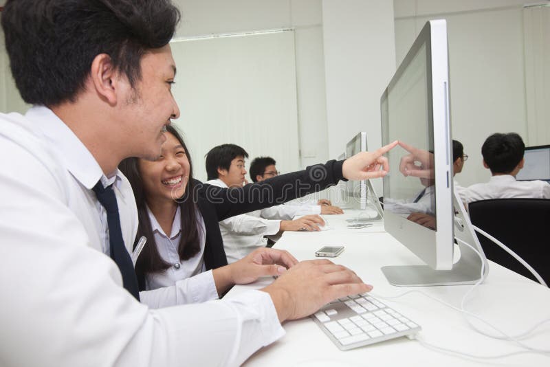 A Class of Students in Front of Their Screens Study Computer Science ...