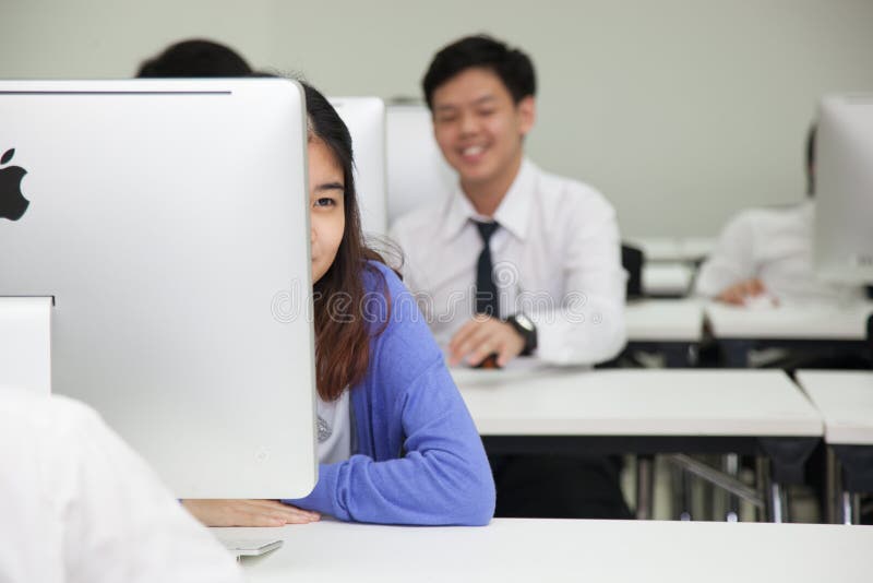 A Class of Students in Front of Their Screens Study Computer Science ...