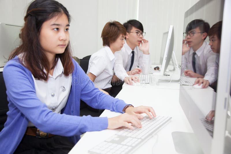 A Class of Students in Front of Their Screens Study Computer Science ...