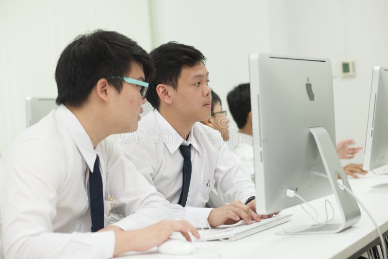 A Class of Students in Front of Their Screens Study Computer Science ...