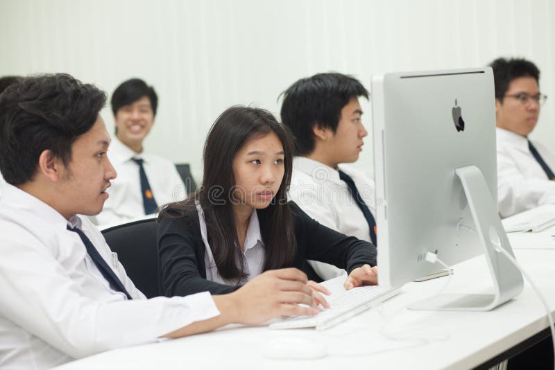 A Class of Students in Front of Their Screens Study Computer Science ...