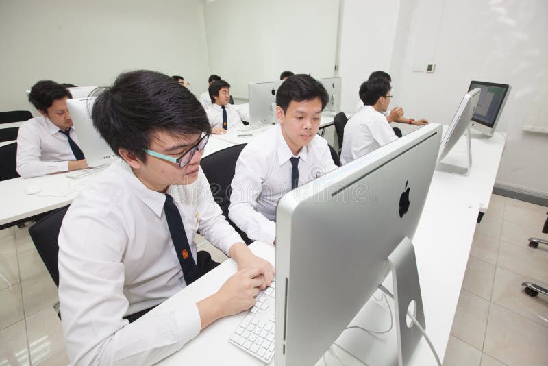 A Class of Students in Front of Their Screens Study Computer Science ...