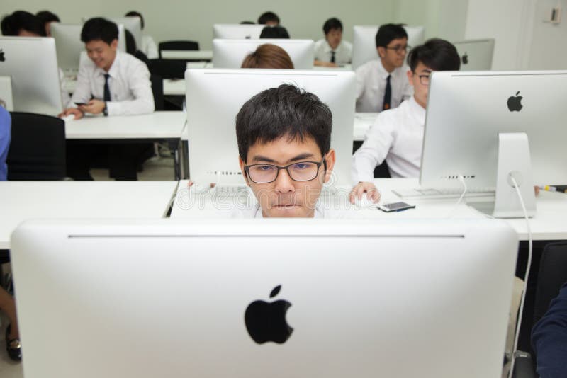 A Class of Students in Front of Their Screens Study Computer Science ...