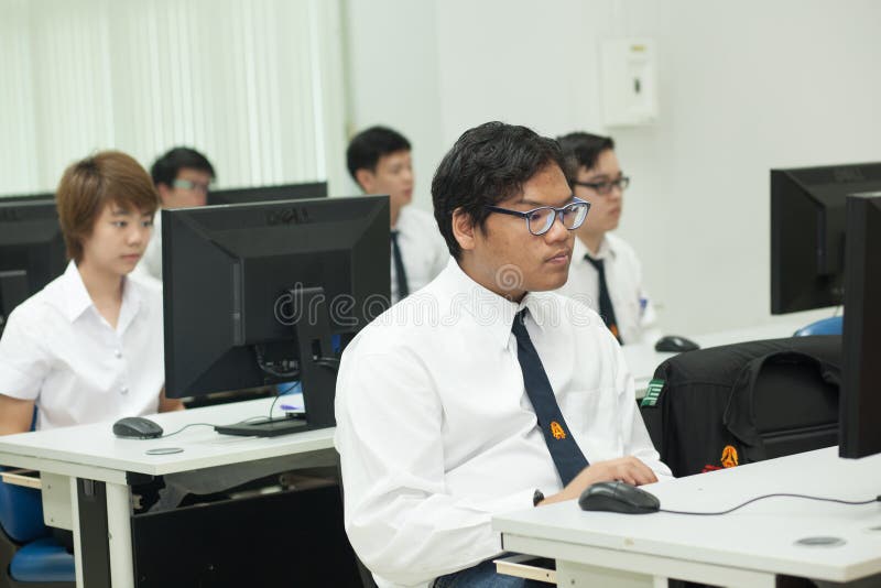 A Class of Students in Front of Their Screens Study Computer Science ...