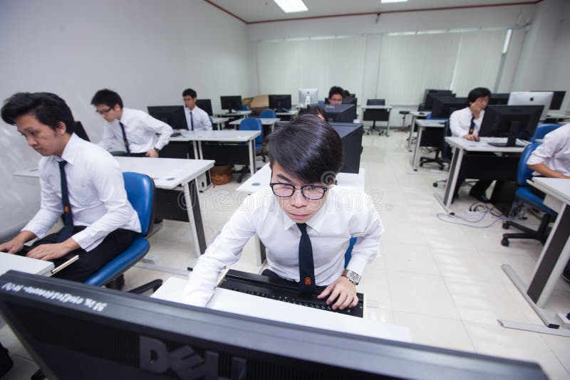 A Class of Students in Front of Their Screens Study Computer Science ...