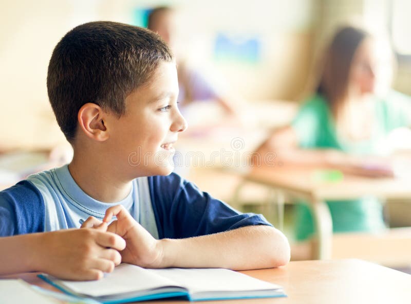Elementary School Pupil in Classroom Stock Photo - Image of inside ...
