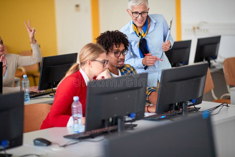 Class with Multi-ethnic Students on Computer on University Academy ...