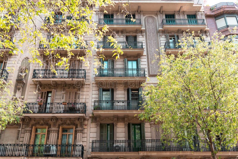 Classic Apartment Building with Balconies and Shutters in Barcelona ...