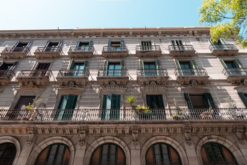 Classic Apartment Building with Balconies and Shutters in Barcelona ...