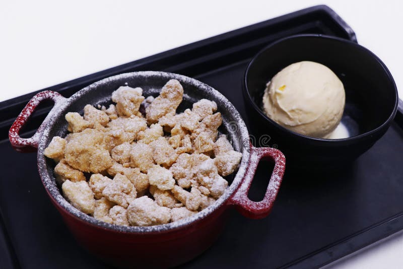 Classic Apple and Cherry Crumble with Vanilla Ice Cream Stock Photo ...