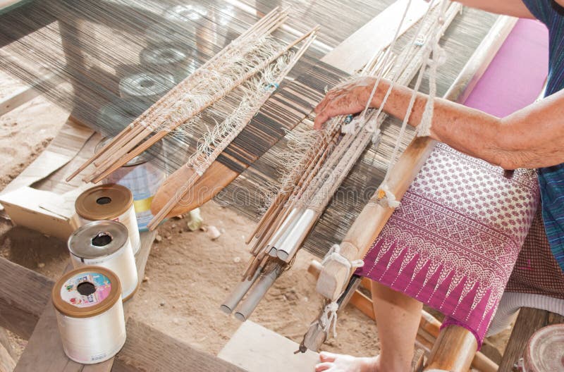 Classic asian loom at work stock image. Image of fashion - 32633749