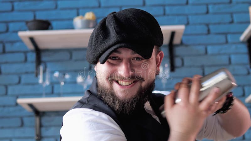 A Classic Authentic Bartender with a Smile and Hat Makes an Alcoholic ...