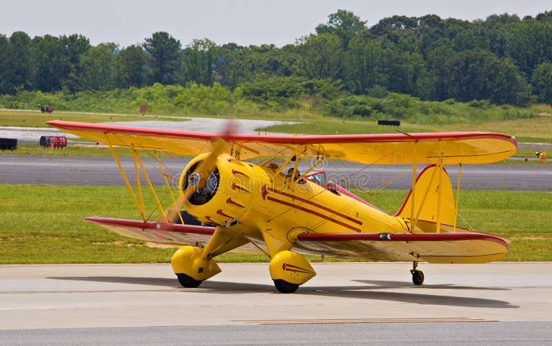 Classic biplane landing stock photo. Image of plane, open - 11592890