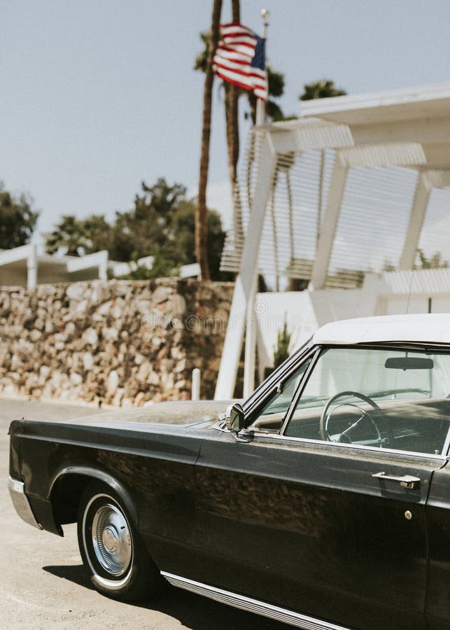 Classic Black Car Parked Outside a House Stock Image - Image of ...