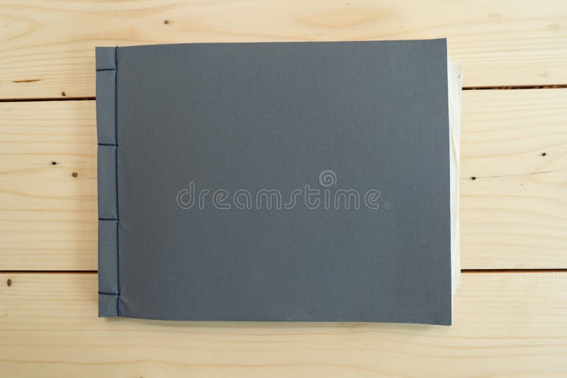 Classic Black Notebook on the Wood Table Stock Image - Image of ...