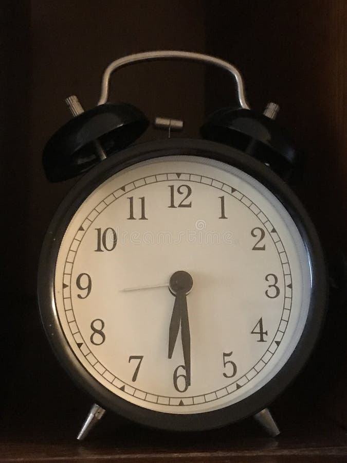 Black Clock with Black Numbers and Twin-bell Alarm Stock Image - Image ...