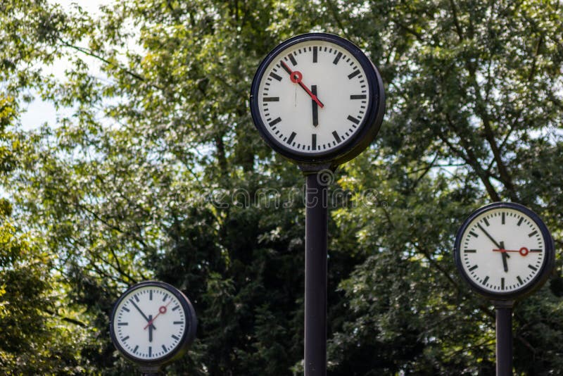 Classic Black and White Analog Clocks with Synchronized Time Show ...