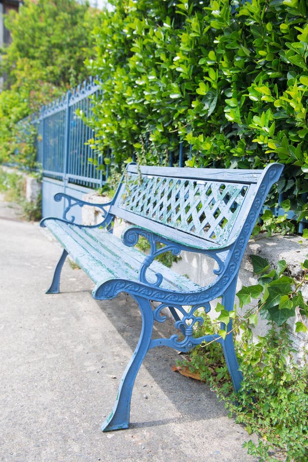 Classic blue bench outdoor stock image. Image of sunny - 128292323