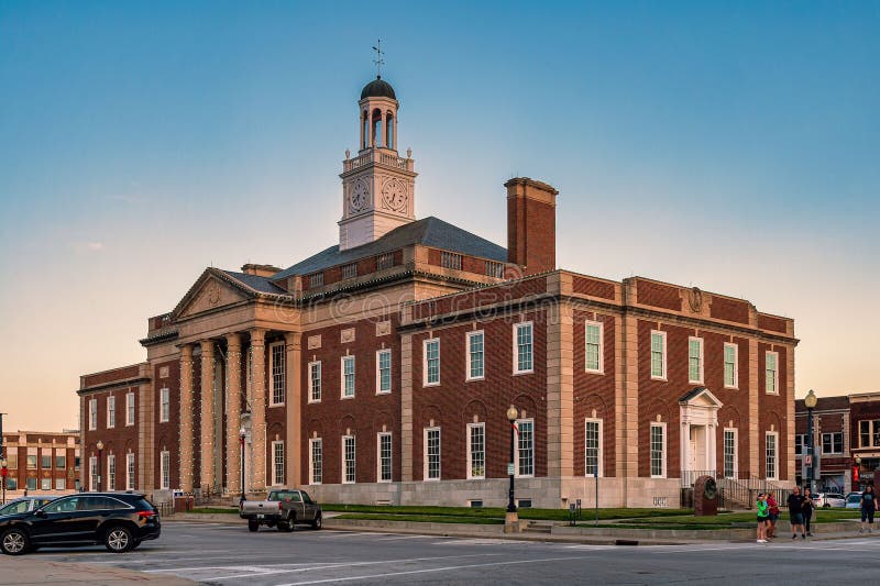 Classic Brick Courthouse Building with a Clock Tower at Sunset in a ...
