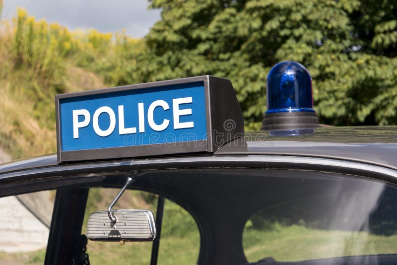 Classic british police car stock image. Image of blue - 78365635