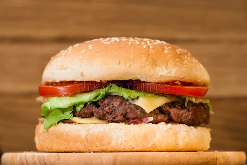 Classic burger close-up stock image. Image of unhealthy - 120662279