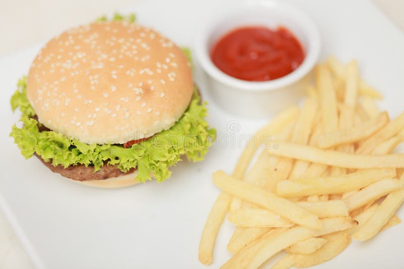 Classic Burger with French Fries on the Table Stock Image - Image of ...