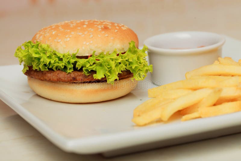 Classic Burger with French Fries on the Table Stock Image - Image of ...