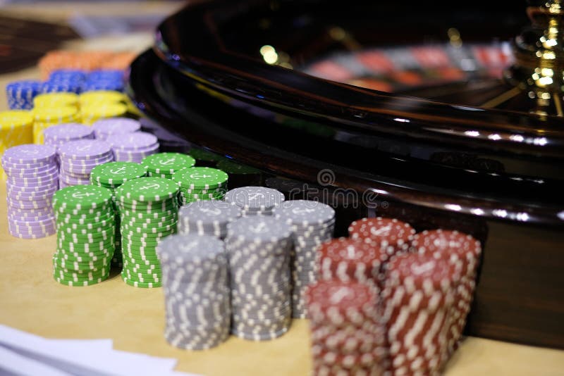 Classic Casino Roulette Wheel and Chips Stock Image - Image of ...