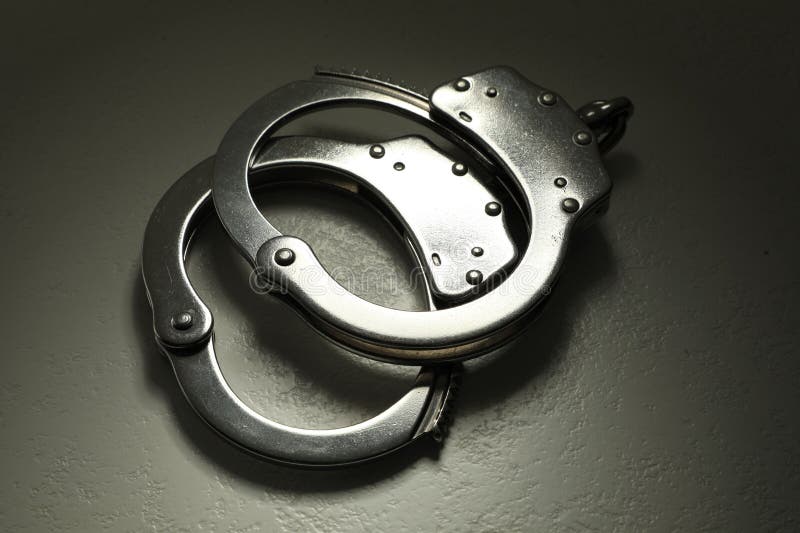 Classic Chain Handcuffs on Grey Table, Closeup Stock Photo - Image of ...