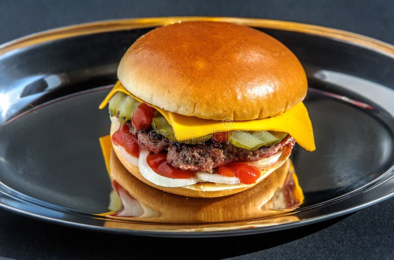 Classic Cheeseburger on a Metal Plate Stock Photo - Image of lunch ...