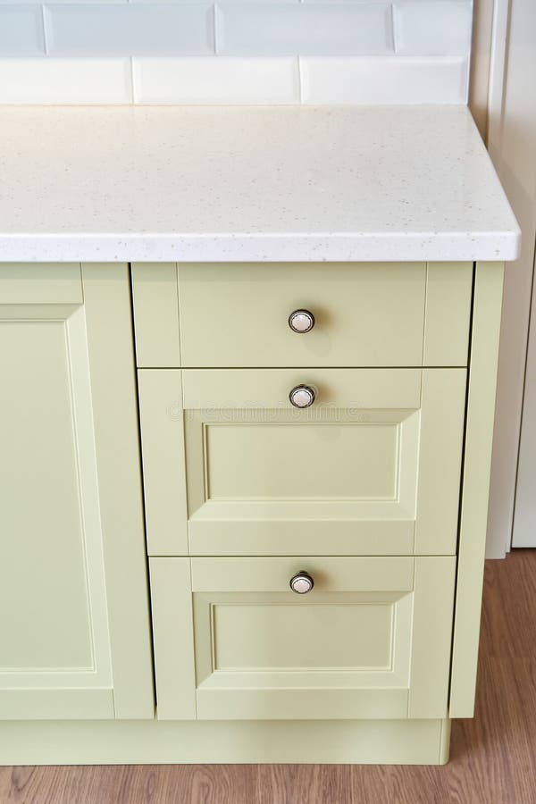 Classic Chest of Drawers with Light Green Facades in Kitchen Stock ...