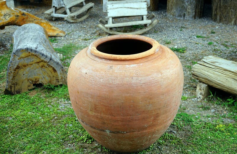 A Classic Clay Jar Pot on the Grass in the Garden, Classic Vintage ...