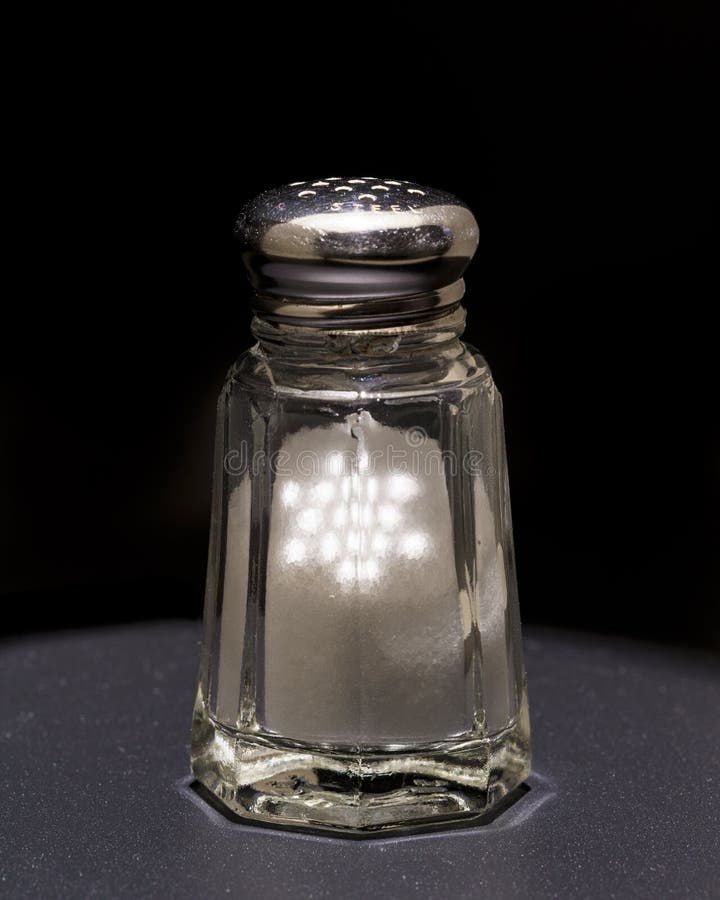 A Classic Diner Salt Shaker Lit from Above Stock Photo - Image of ...