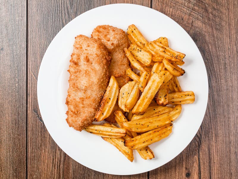 Classic Fish and Chips Dish on a Wooden Table. Top Down View Stock ...