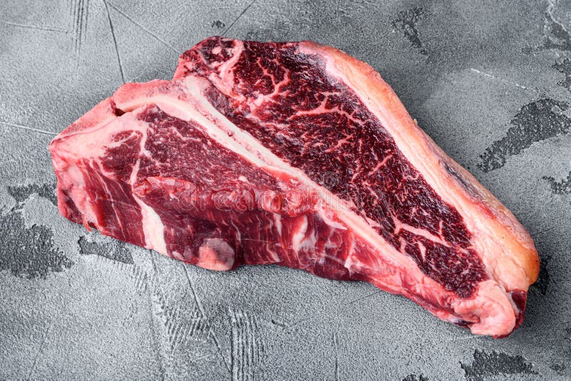 Classic Fresh Beef Striploin Steaks,T Bone Cut, on Gray Stone ...