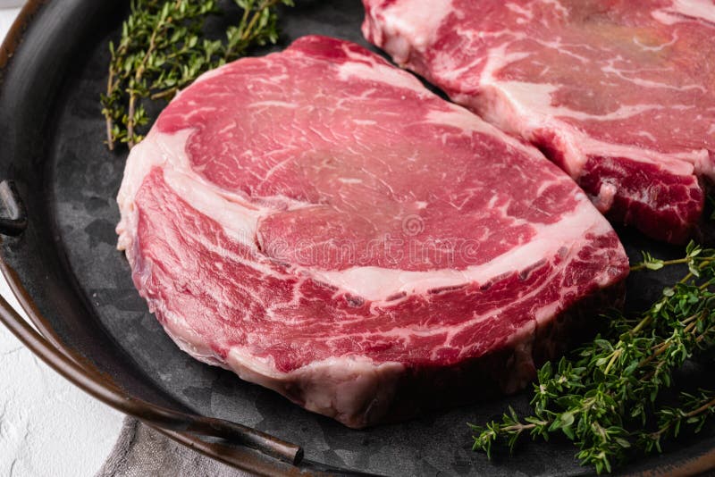 Classic Fresh Rib Eye Steak, on White Stone Table Background Stock ...