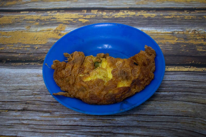 A Classic Fried Omelette with a Soft Center and a Crispy Texture ...