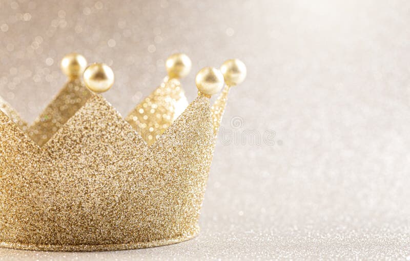 A a Classic Golden Crown on a Glittery Golden Background Stock Image ...