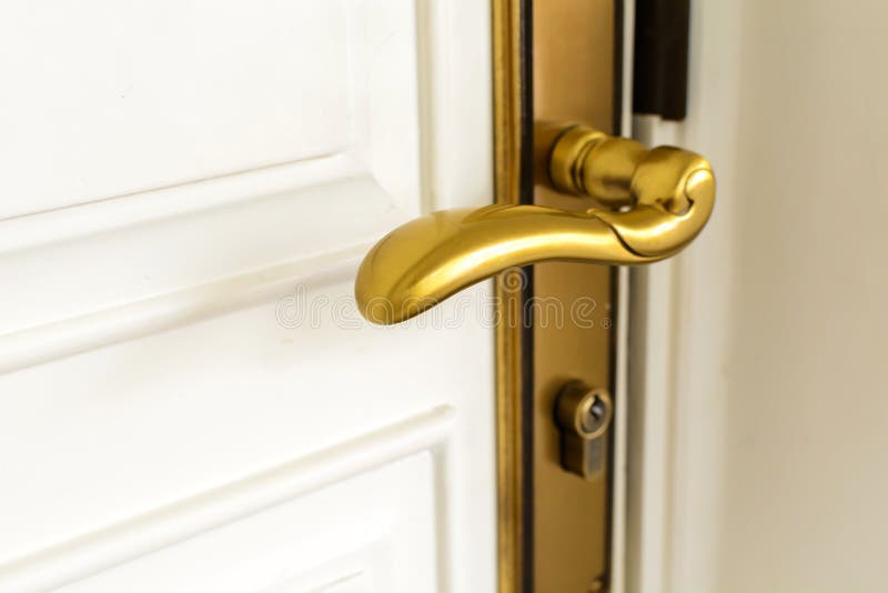 Classic Golden Door Handle on White Door Stock Image - Image of front ...