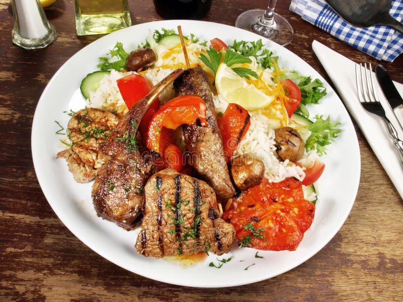 Classic Greek Meat Plate with Rice and Salad Stock Photo - Image of ...