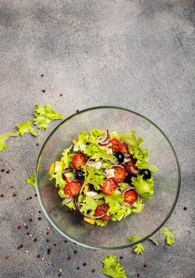 Classic Greek Salad in a Glass Deep Plate. Top View. Copy Space for ...