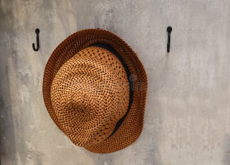 Classic Hat Hanging on Hook on Grey Wall. Stock Image - Image of ...