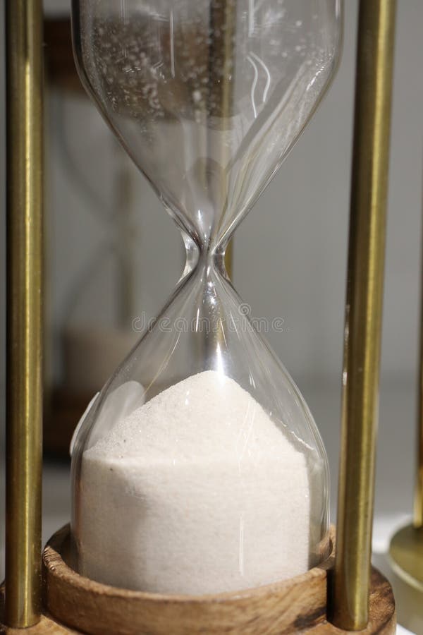 The Classic Hourglass Timer Serves As a Timeless Symbol Representing ...