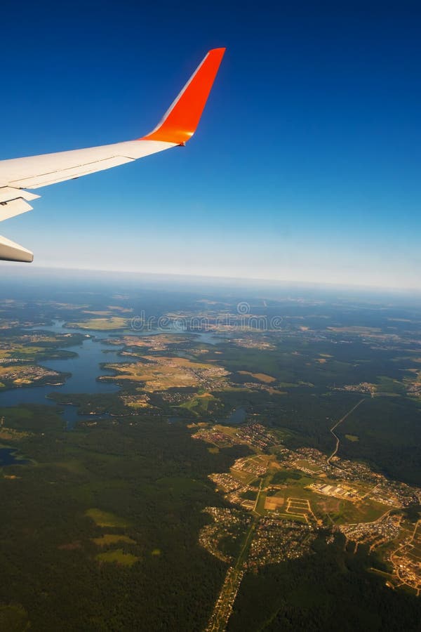 Classic Image through Aircraft Window Onto Wing. Flight View Over ...