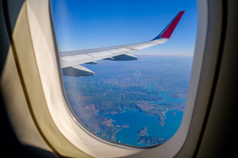 Classic Image through Aircraft Window Onto Wing. Flight View Over ...