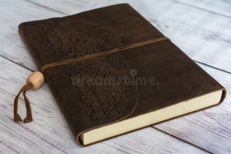 Classic Leather Bound Journal Book on a White Barn Board Floor Close Up ...