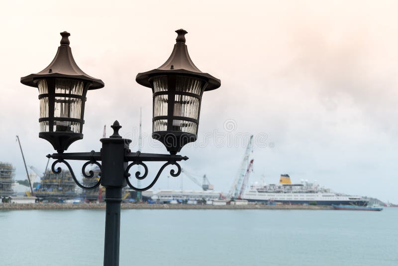 Classic Light Pole at Beach with Port Background Stock Image - Image of ...