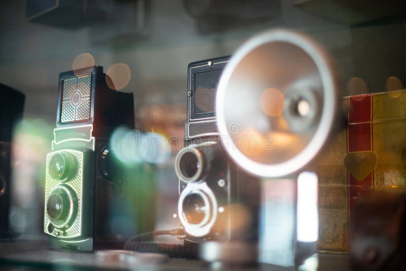 A Classic Looking Vintage Camera in a Showcase Stock Image - Image of ...